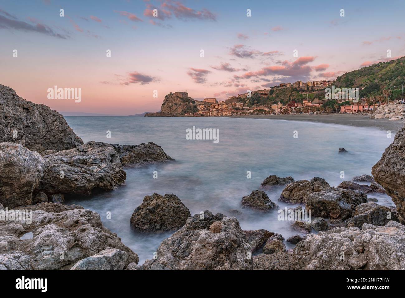 Scilla beach with the town in the background at dusk, Calabria Stock ...