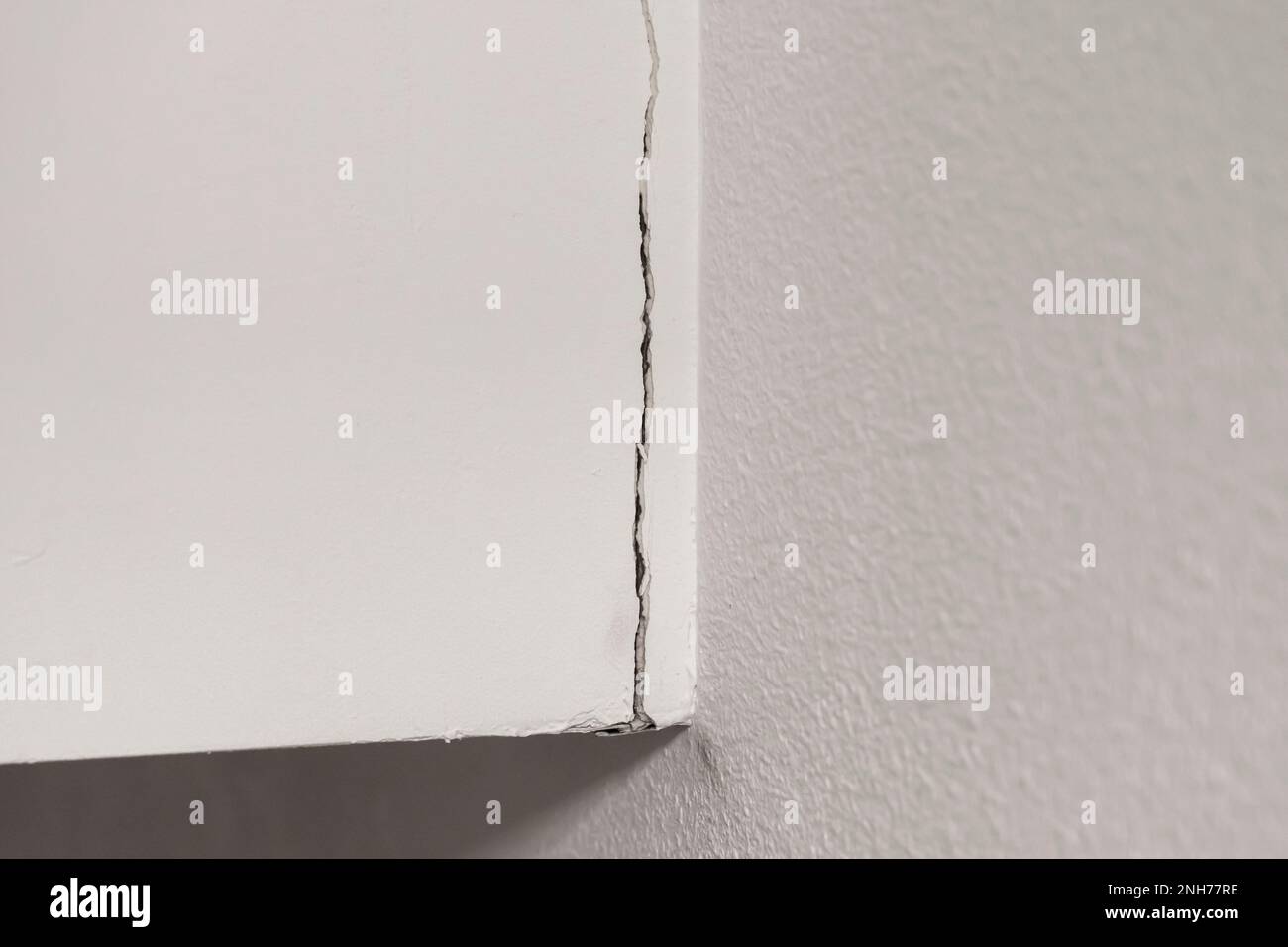 Cracked damaged interior wall of house apartment from earthquake ...
