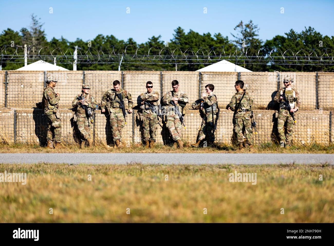 U.S. Army Soldiers with the 404th Civil Affairs Battallion await ...