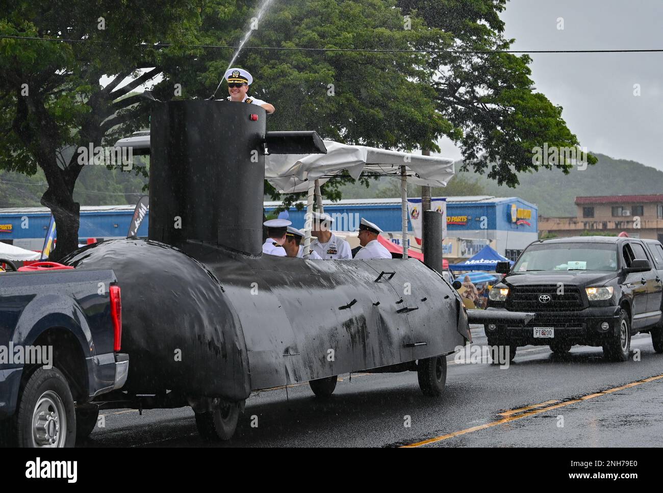 U.S. Navy members ride on their float during Guam's Liberation Day ...