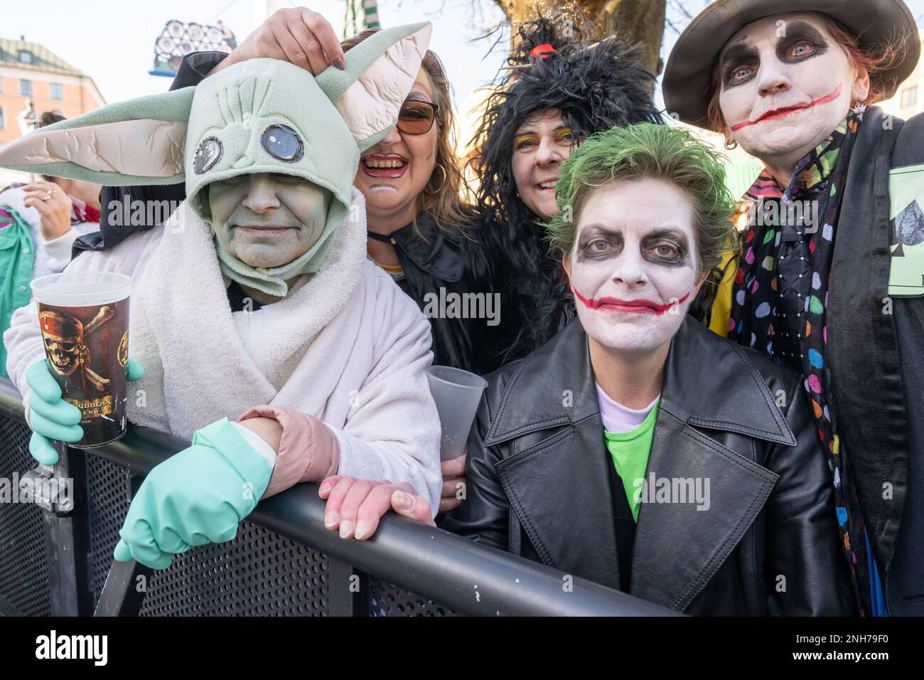Munich, Germany. 21st Feb, 2023. Dressed-up passers-by celebrate at the ...