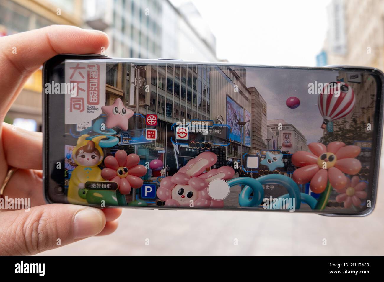 SHANGHAI, CHINA - FEBRUARY 21, 2023 - A tourist uses the "Play Nanbujie ...