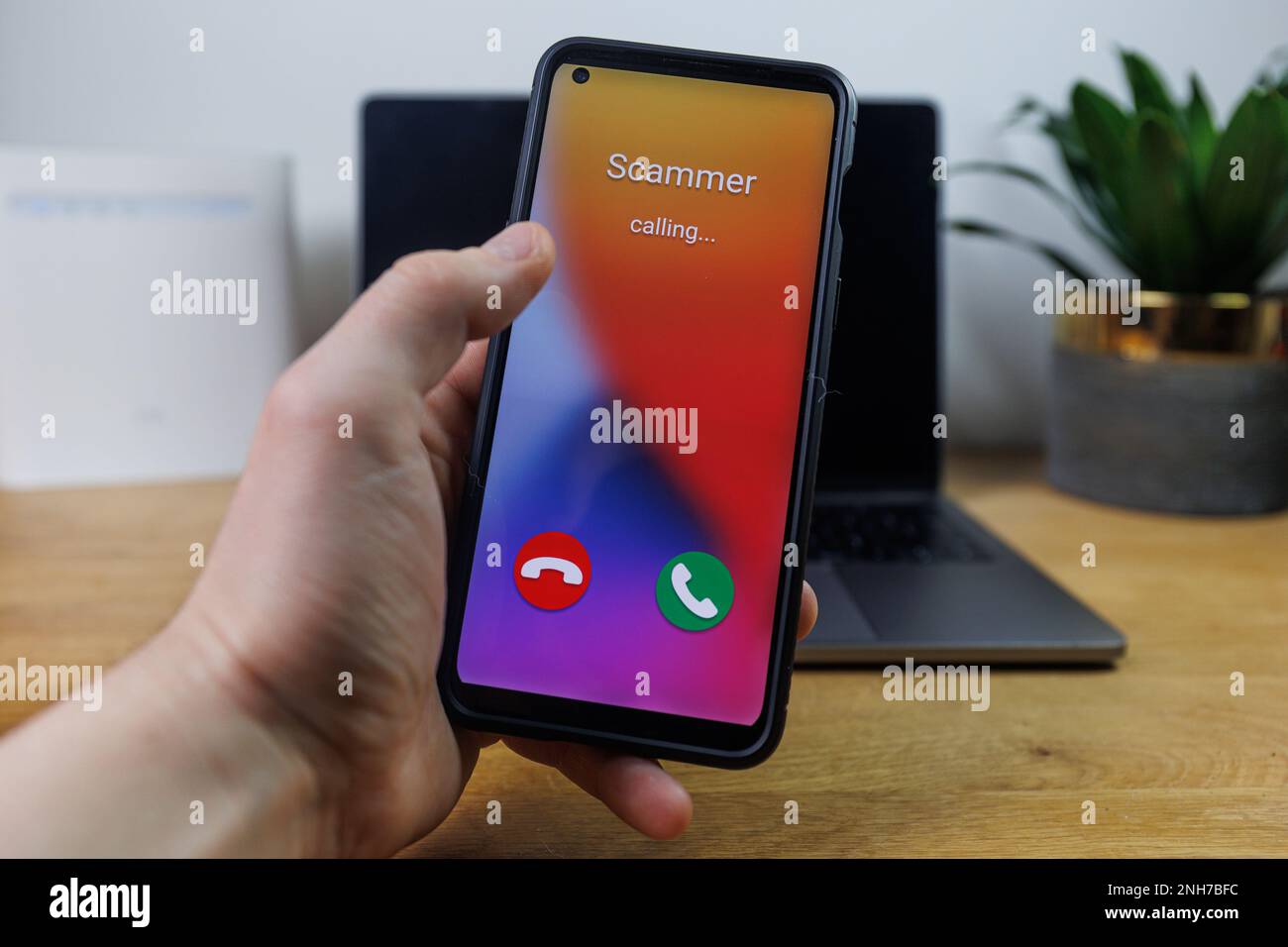Phone call from scammer. Incoming scam call concept Stock Photo - Alamy