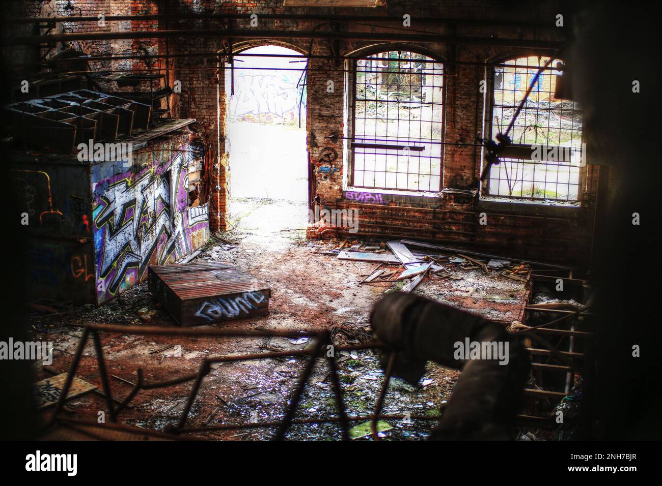View over ruined factory interior full of debris Stock Photo - Alamy