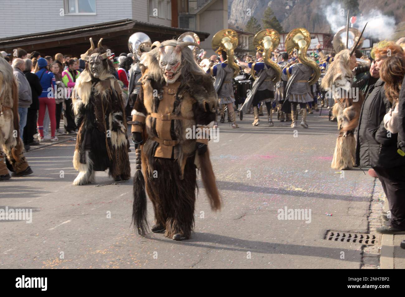 Demon costumes at the Walenstadt Fasnacht procession in the Swiss Alps ...