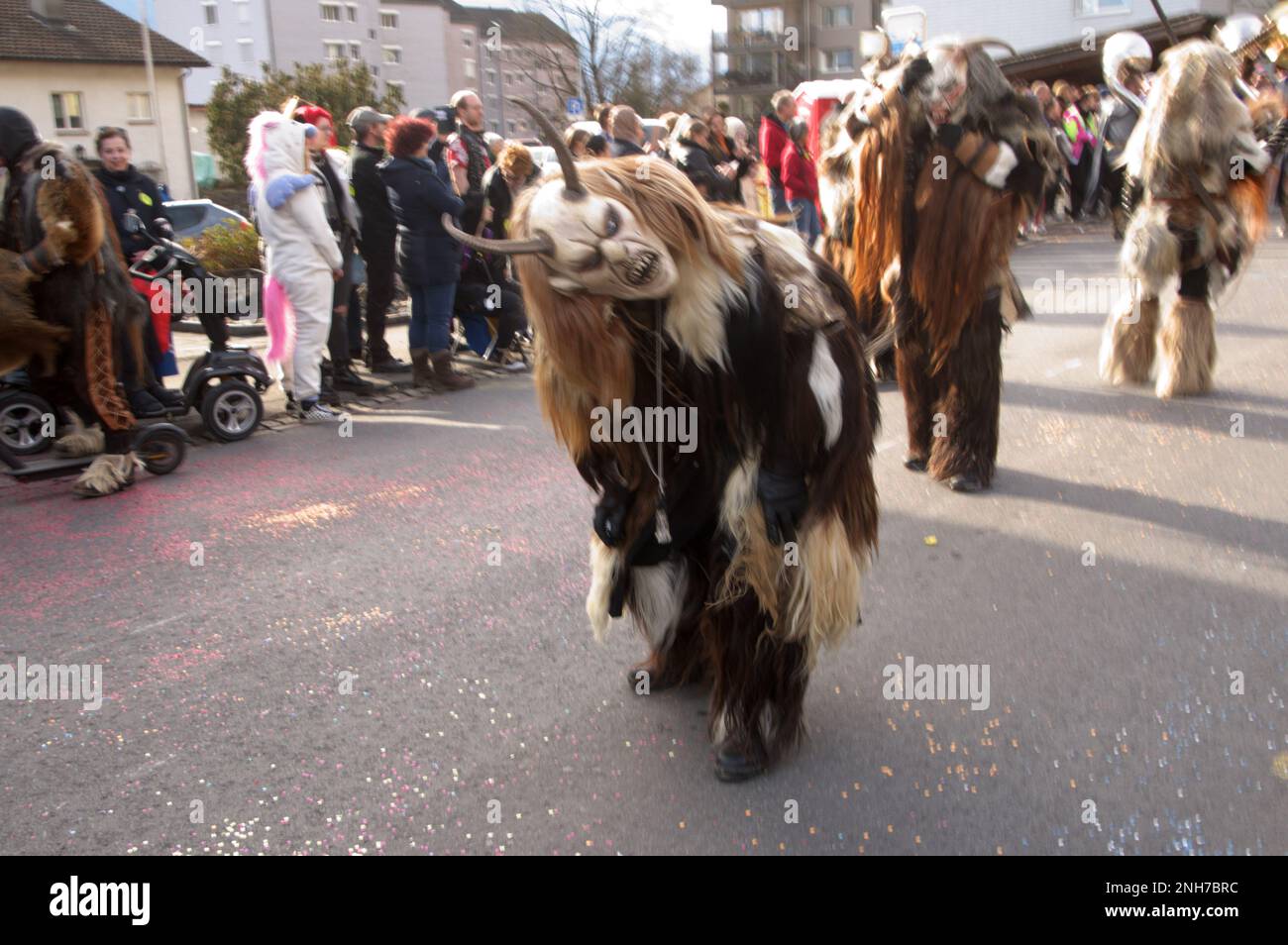 Demon costumes at the Walenstadt Fasnacht procession in the Swiss Alps ...