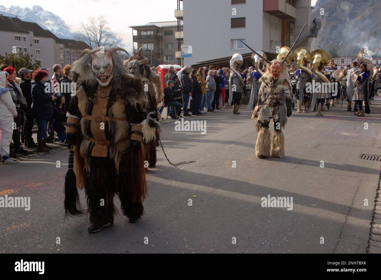 Demon costumes at the Walenstadt Fasnacht procession in the Swiss Alps ...
