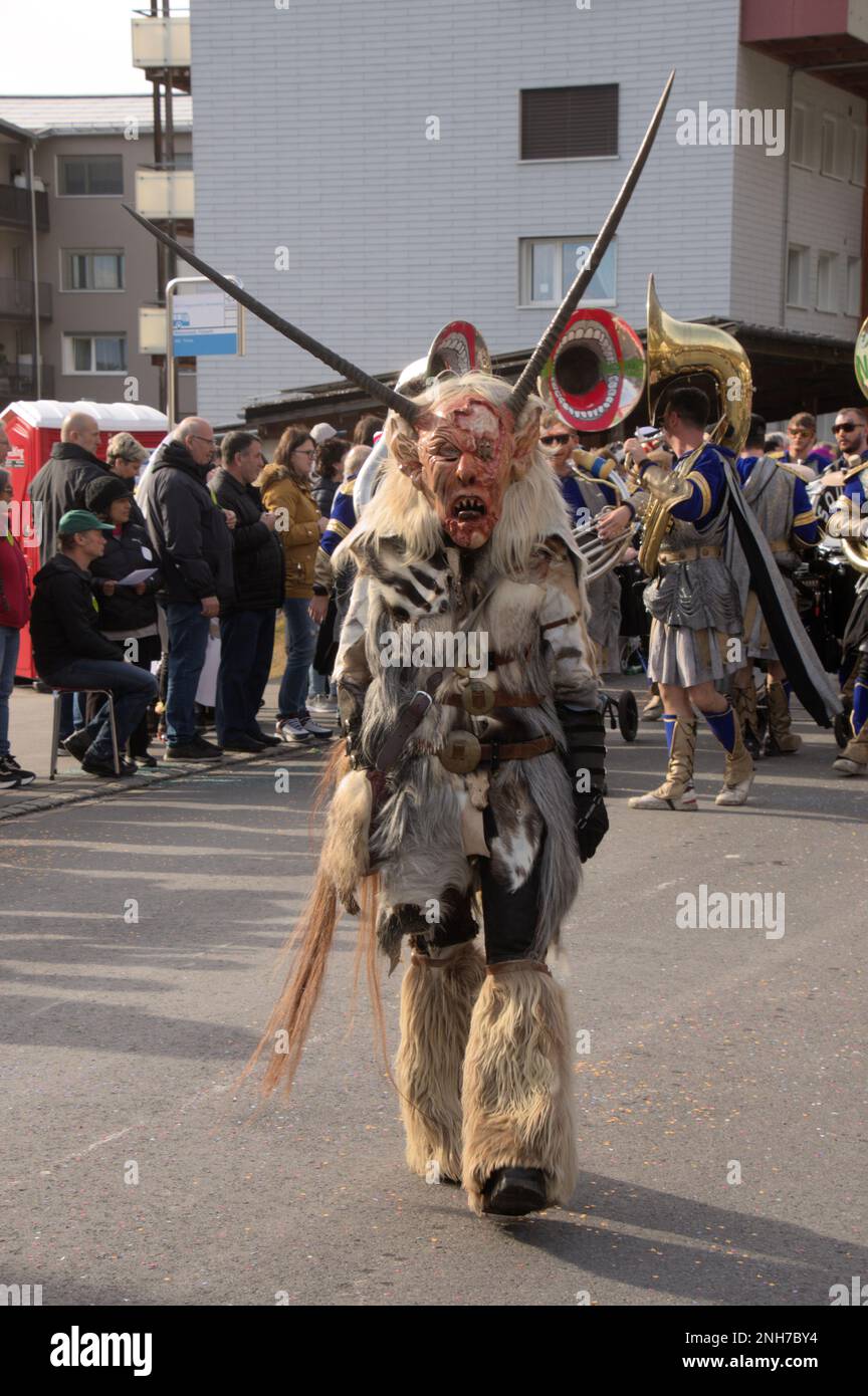 Demon costume at the Walenstadt Fasnacht procession in the Swiss Alps ...