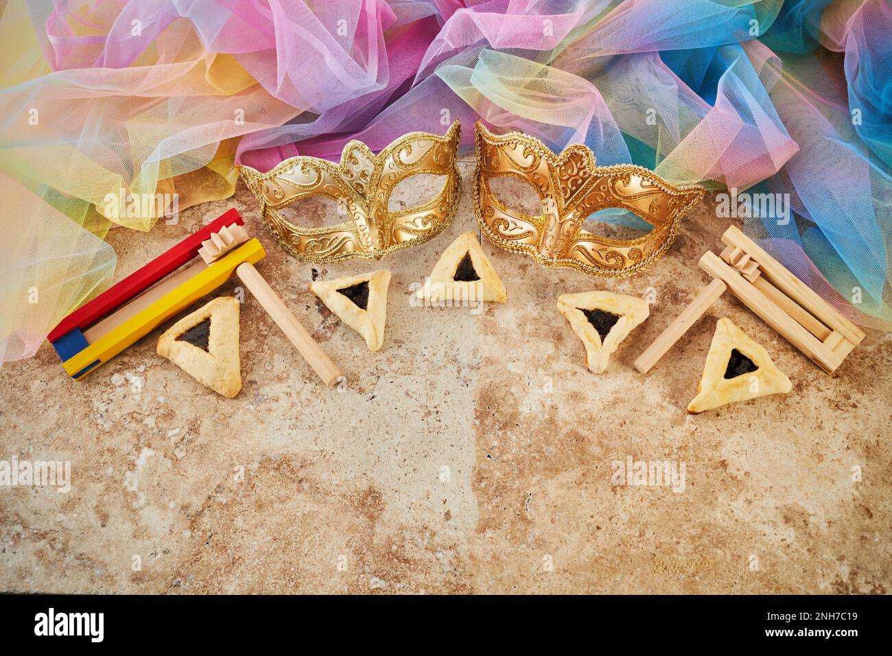 Purim celebration concept. Jewish carnival background. hamantaschen or ...