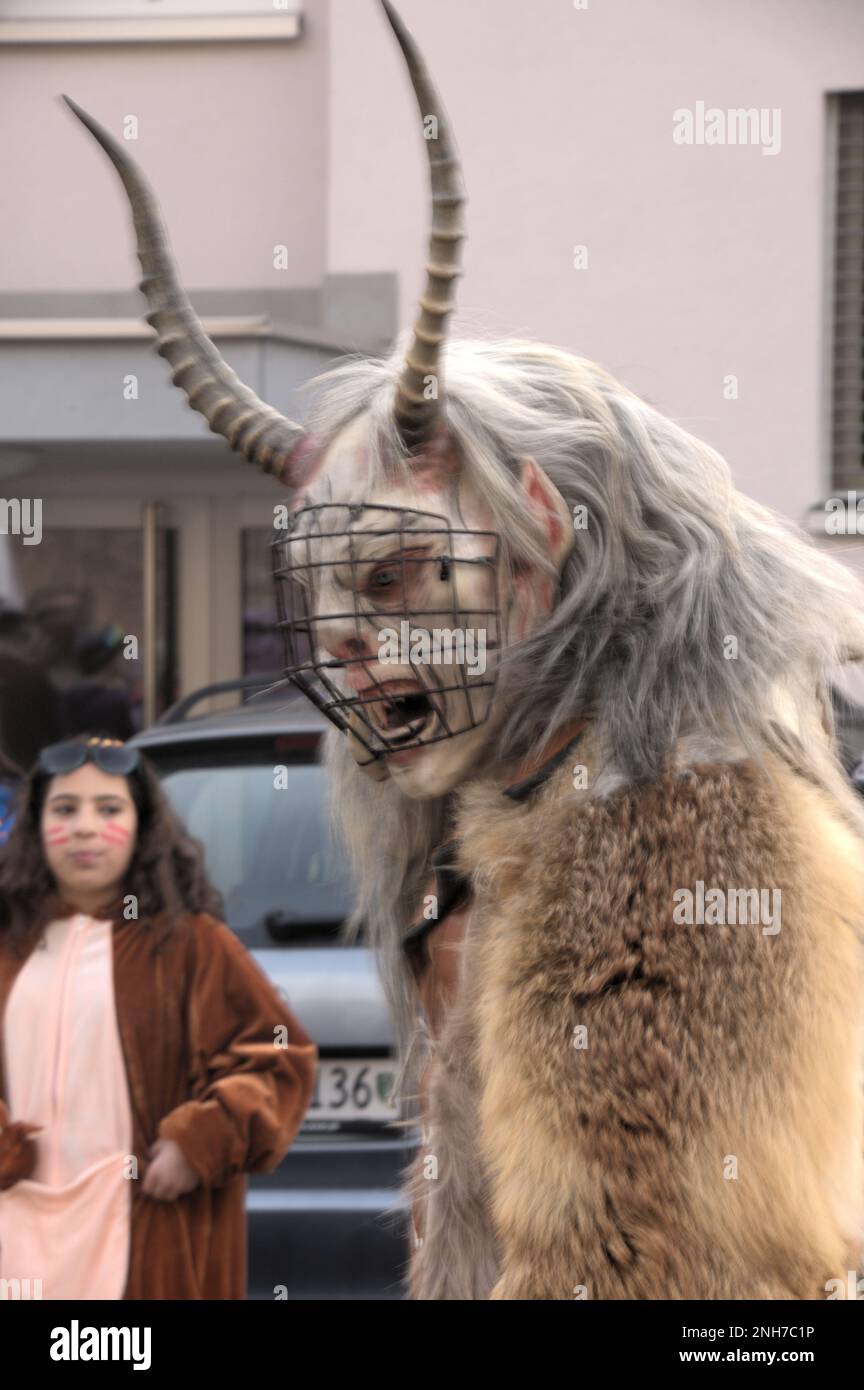 Demon costume at the Walenstadt Fasnacht procession in the Swiss Alps ...