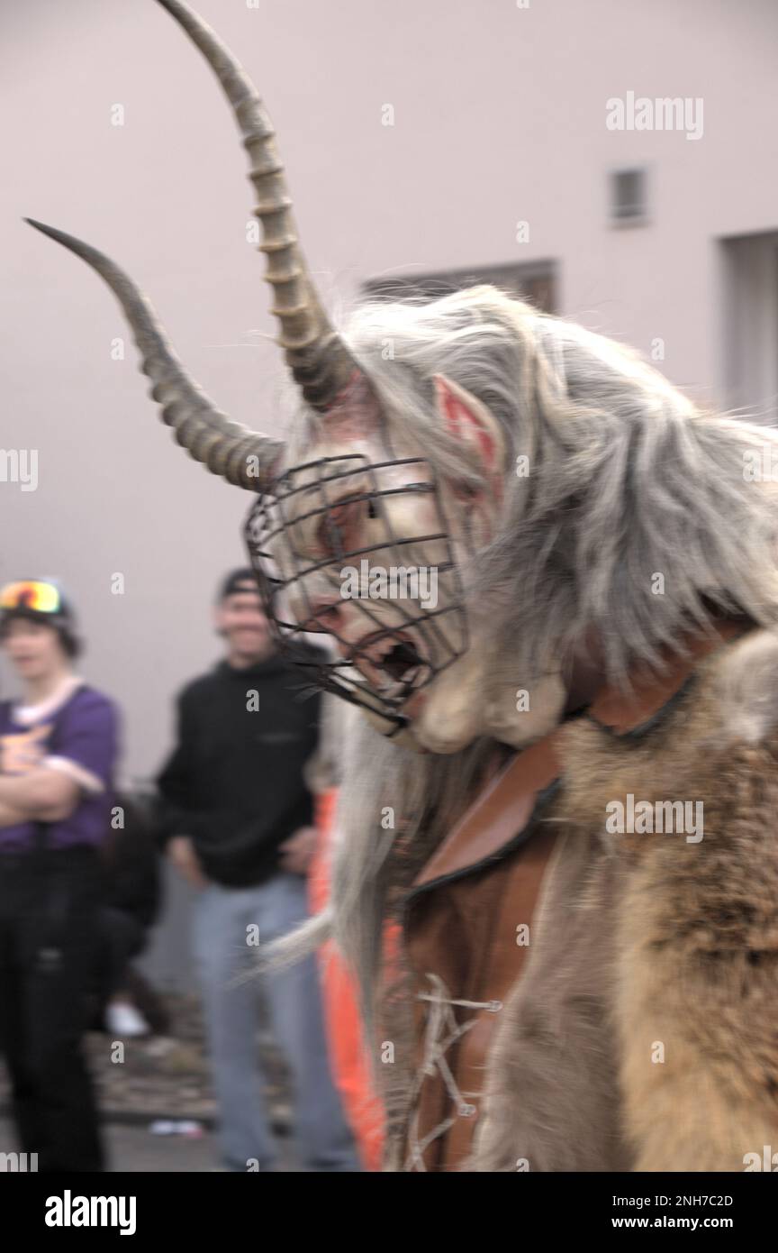 Demon costume at the Walenstadt Fasnacht procession in the Swiss Alps ...