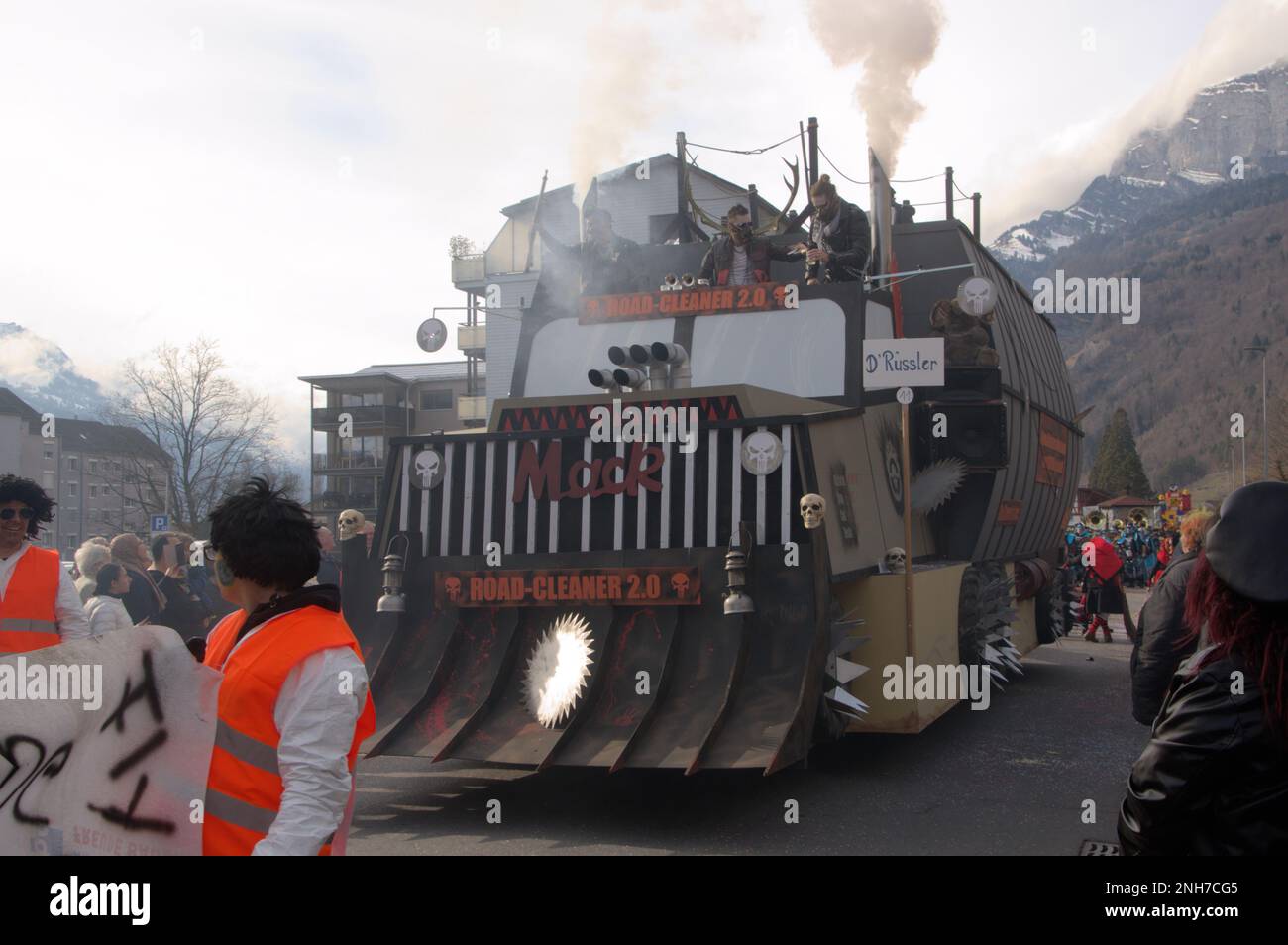 Protestors and ad Max-themed float at the Walenstadt Fasnacht ...