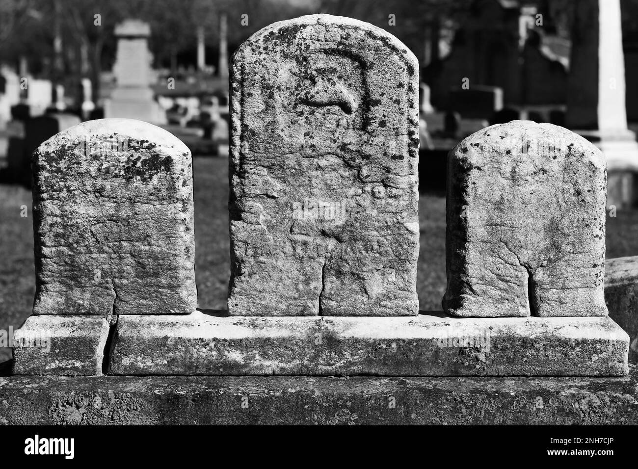 Typical common worn and weathered limestone tombstone with a blank ...