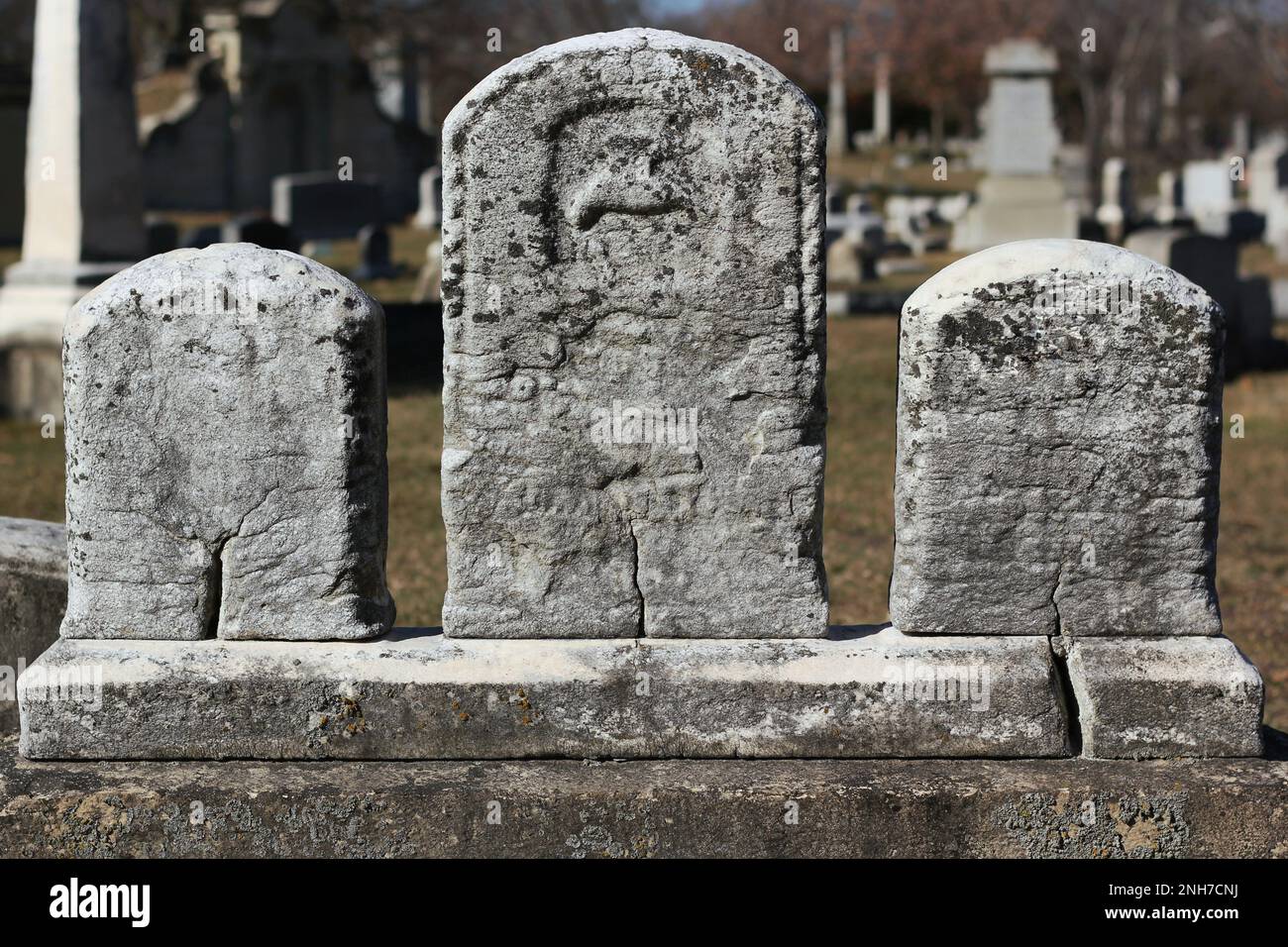 Typical common worn and weathered limestone tombstone with a blank ...