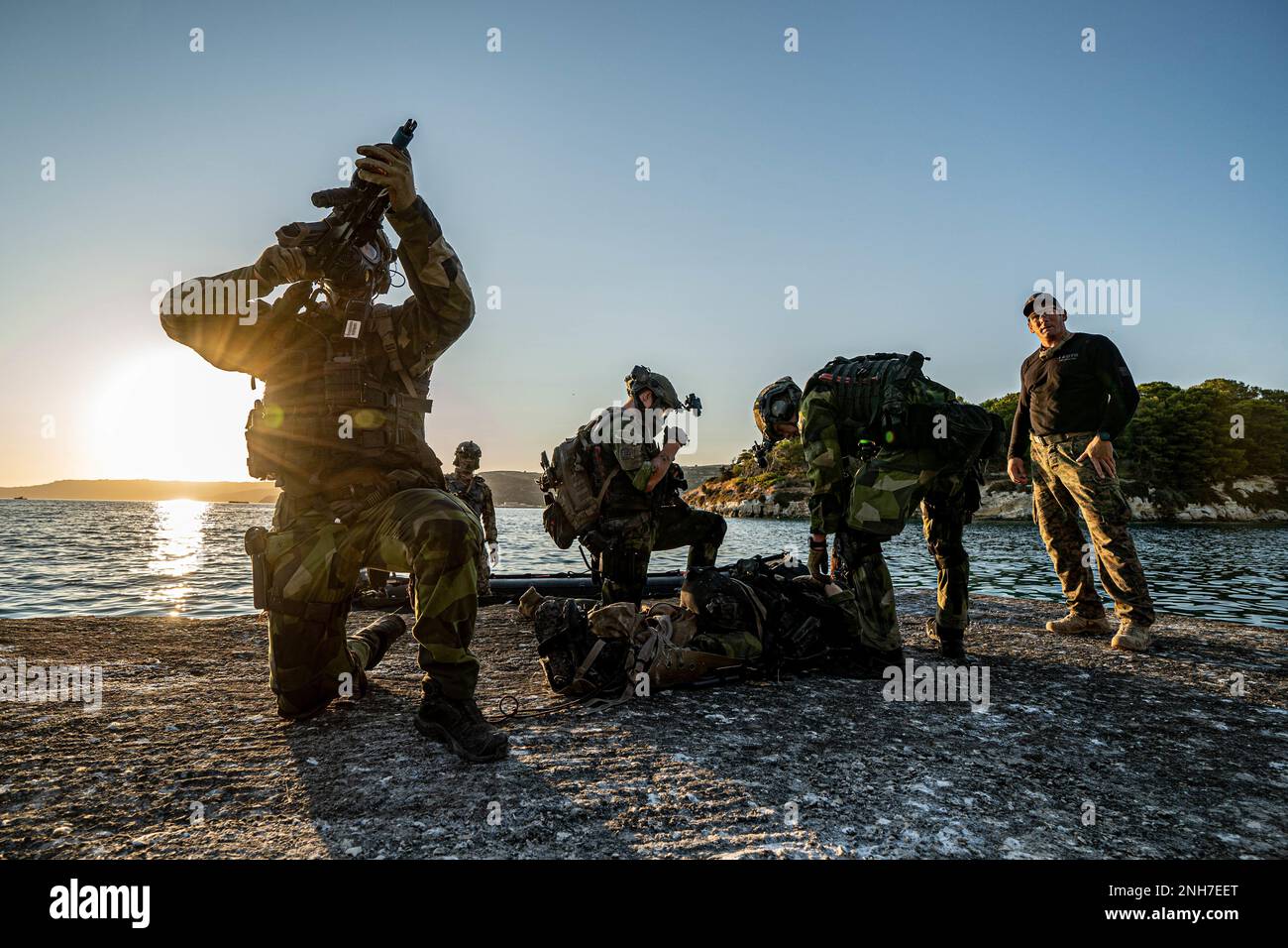 (Right) U.S. Navy Petty Officer First Class Michael Francom, a Special ...