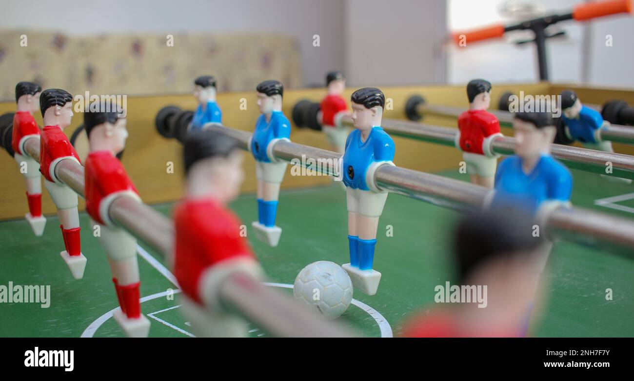 playing soccer with plastic players at home Stock Photo - Alamy