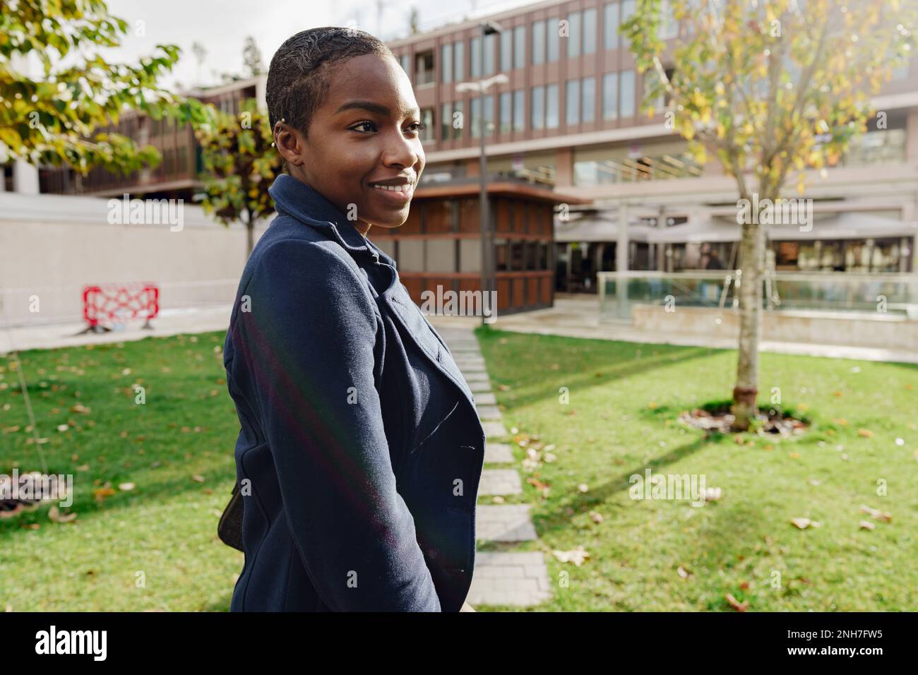 Stylish african female student near university campus Stock Photo - Alamy