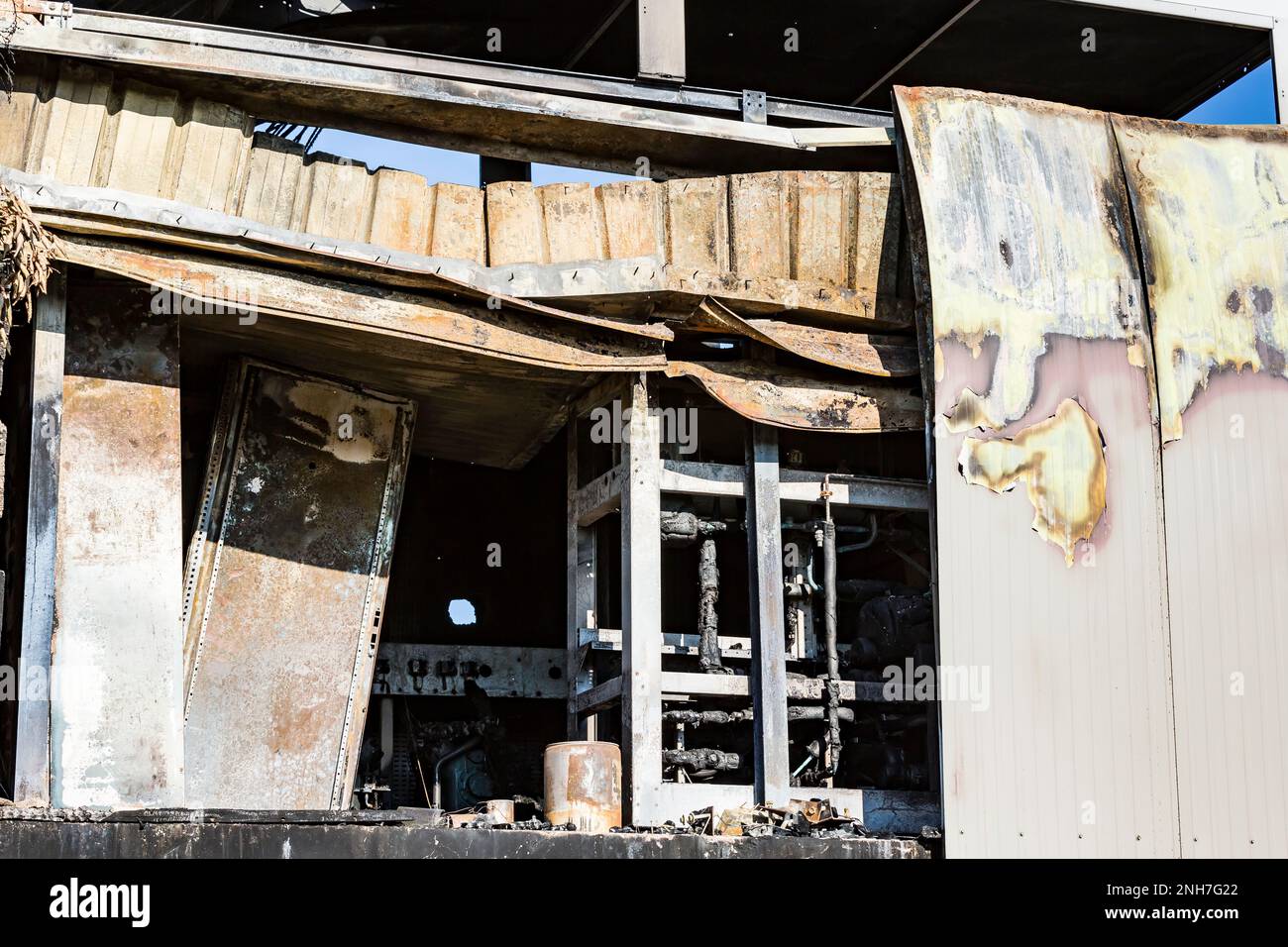 Damaged supermarket boiler room with ventilation, turbine, after arson ...