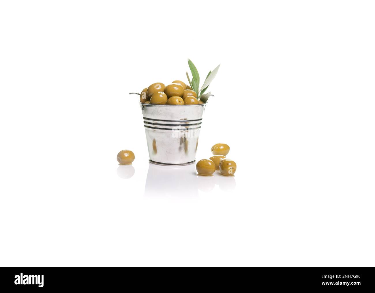 olives in metal bowl isolated on white background Stock Photo - Alamy