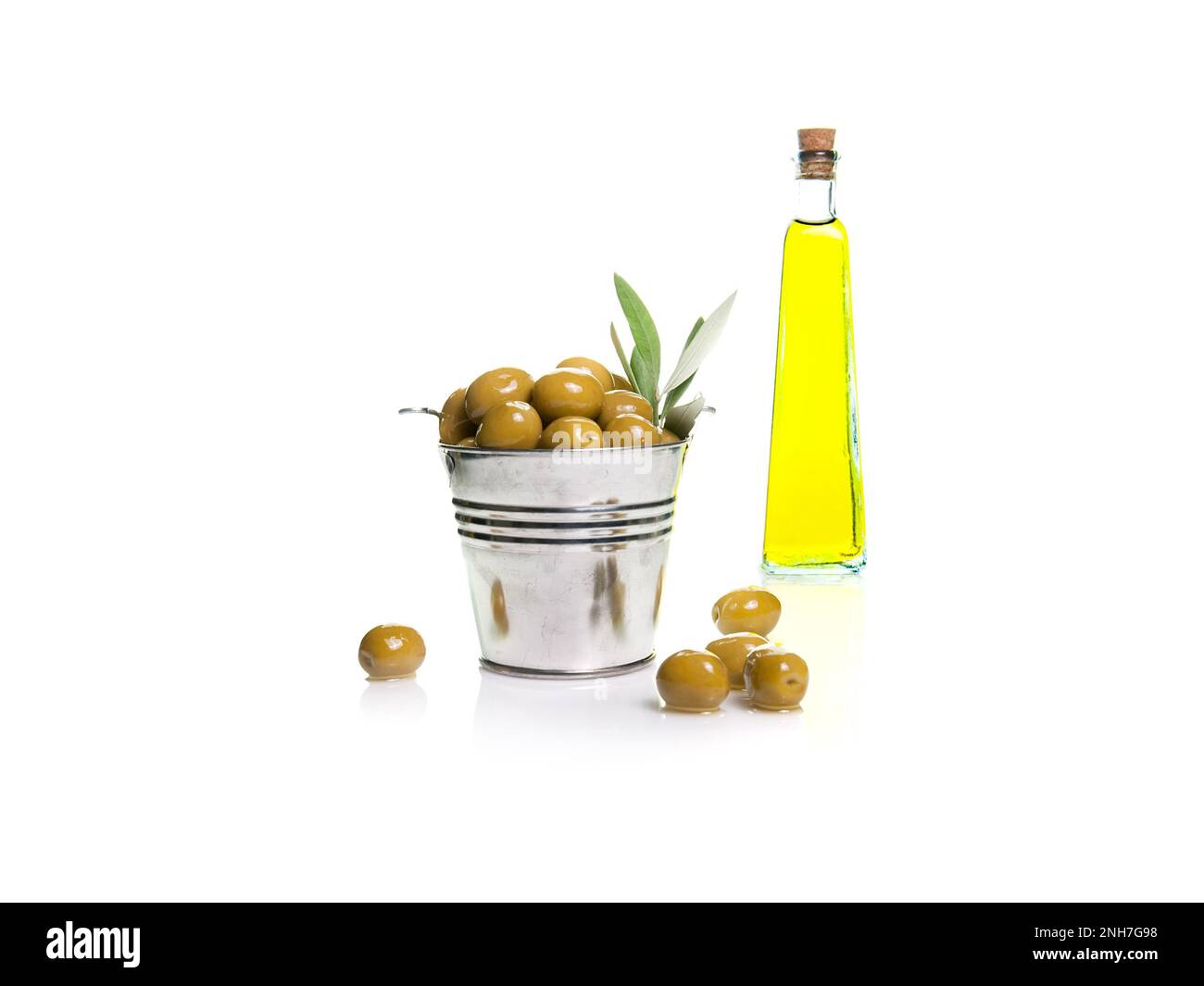 olives in metal bucket on white background Stock Photo - Alamy