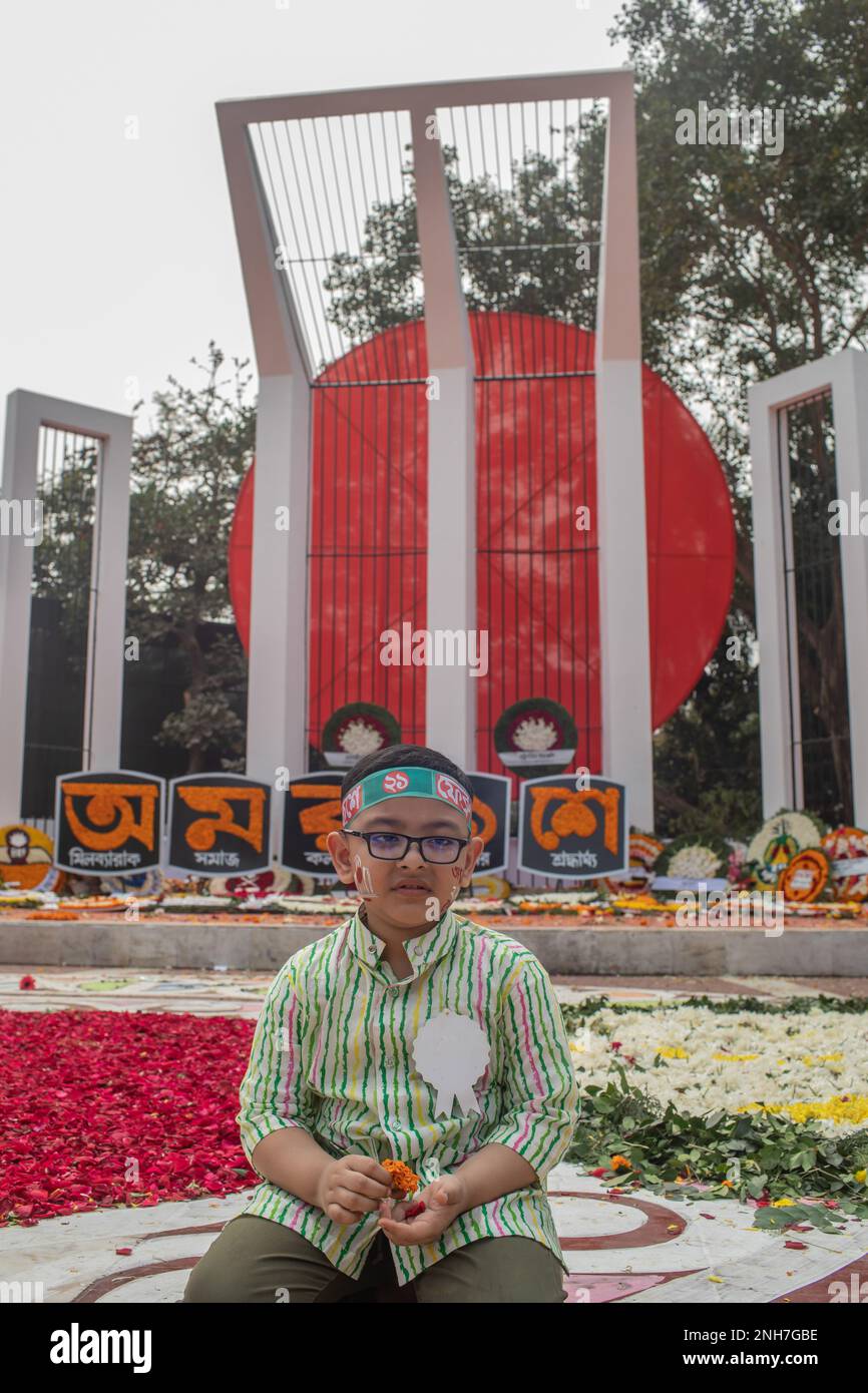 A kid pose for a photo at the Martyr's Monument, or Shaheed Minar ...