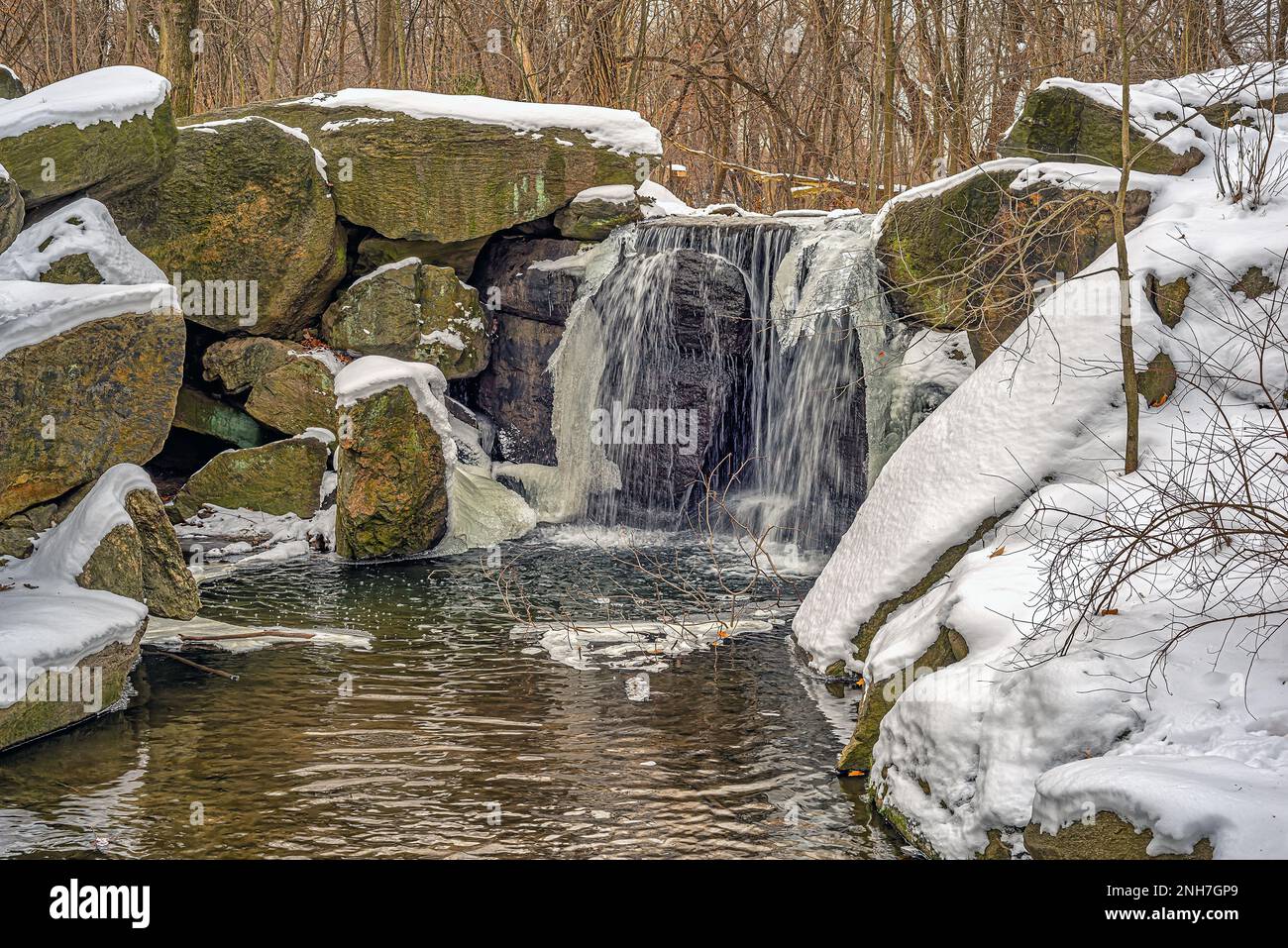 Central Park in winter , waterfall in winter after snow storm Stock ...