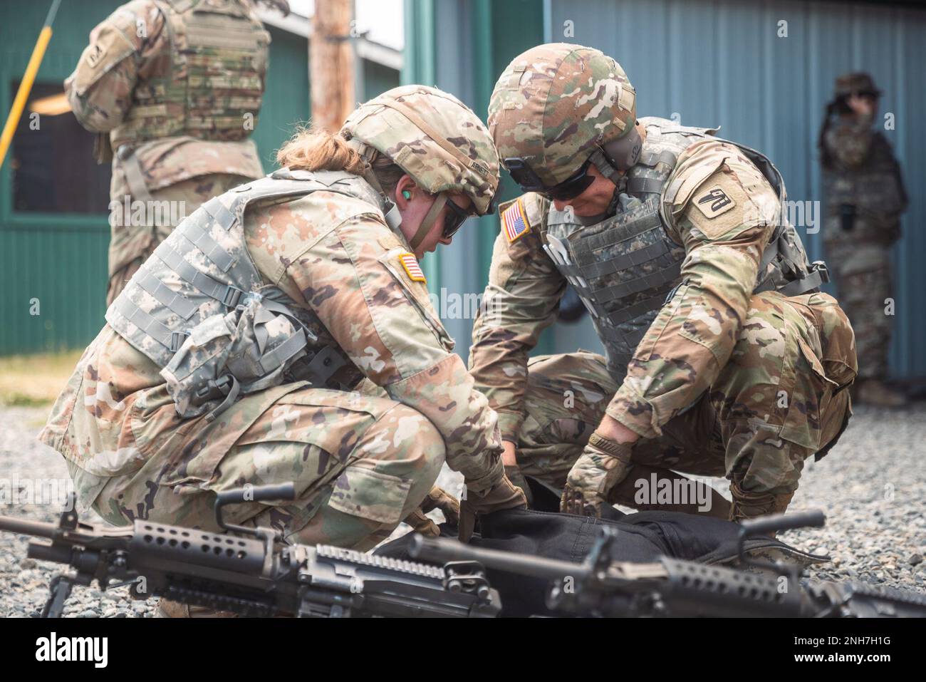 Soldiers from the 181st Brigade Support Battalion conduct a M249 Light ...