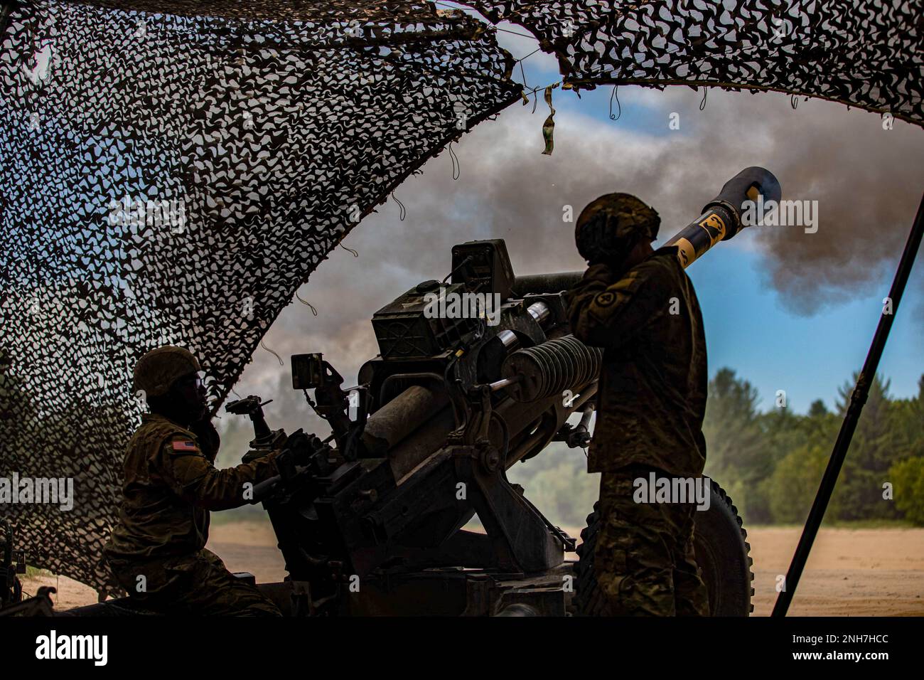 Soldiers with Bravo Battery, 3rd Battalion, 112th Field Artillery Regiment, 44th Infantry ...