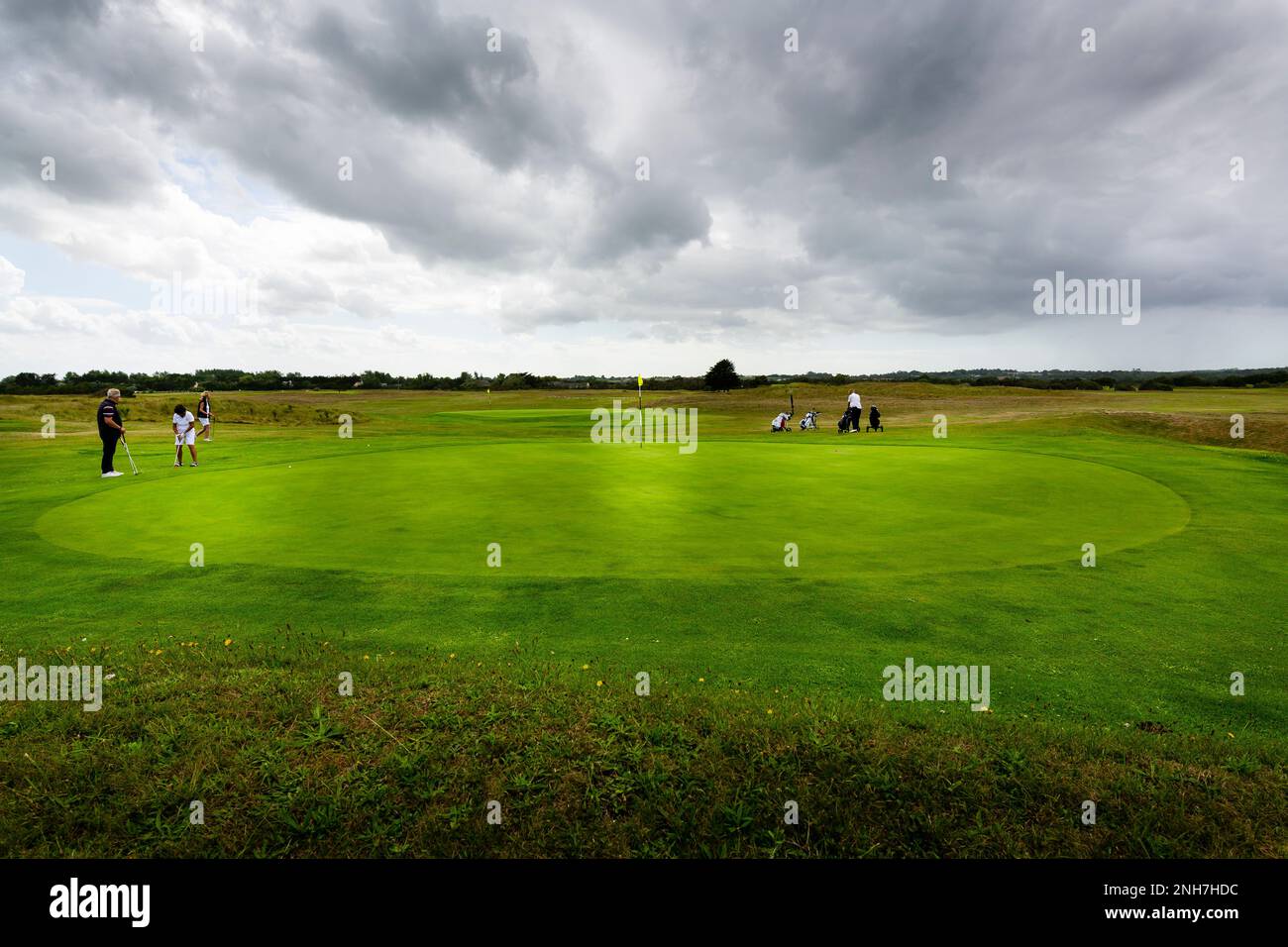 QUINEVILLE, FRANCE - SEPTEMBER Circa, 2020. Three mature men and women ...