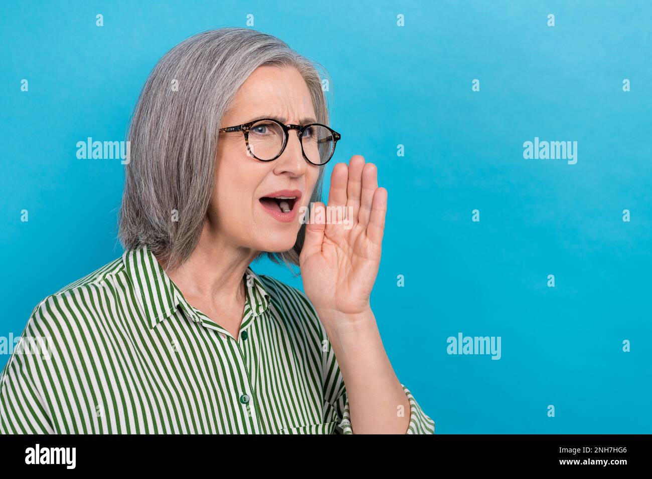 Closeup photo of angry screaming funny retired business woman hand ...
