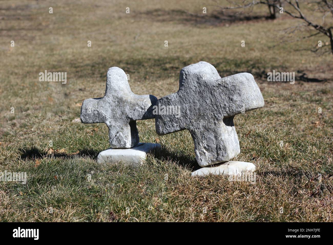 Two stone crosses reaching out for each other forever and ever even in ...