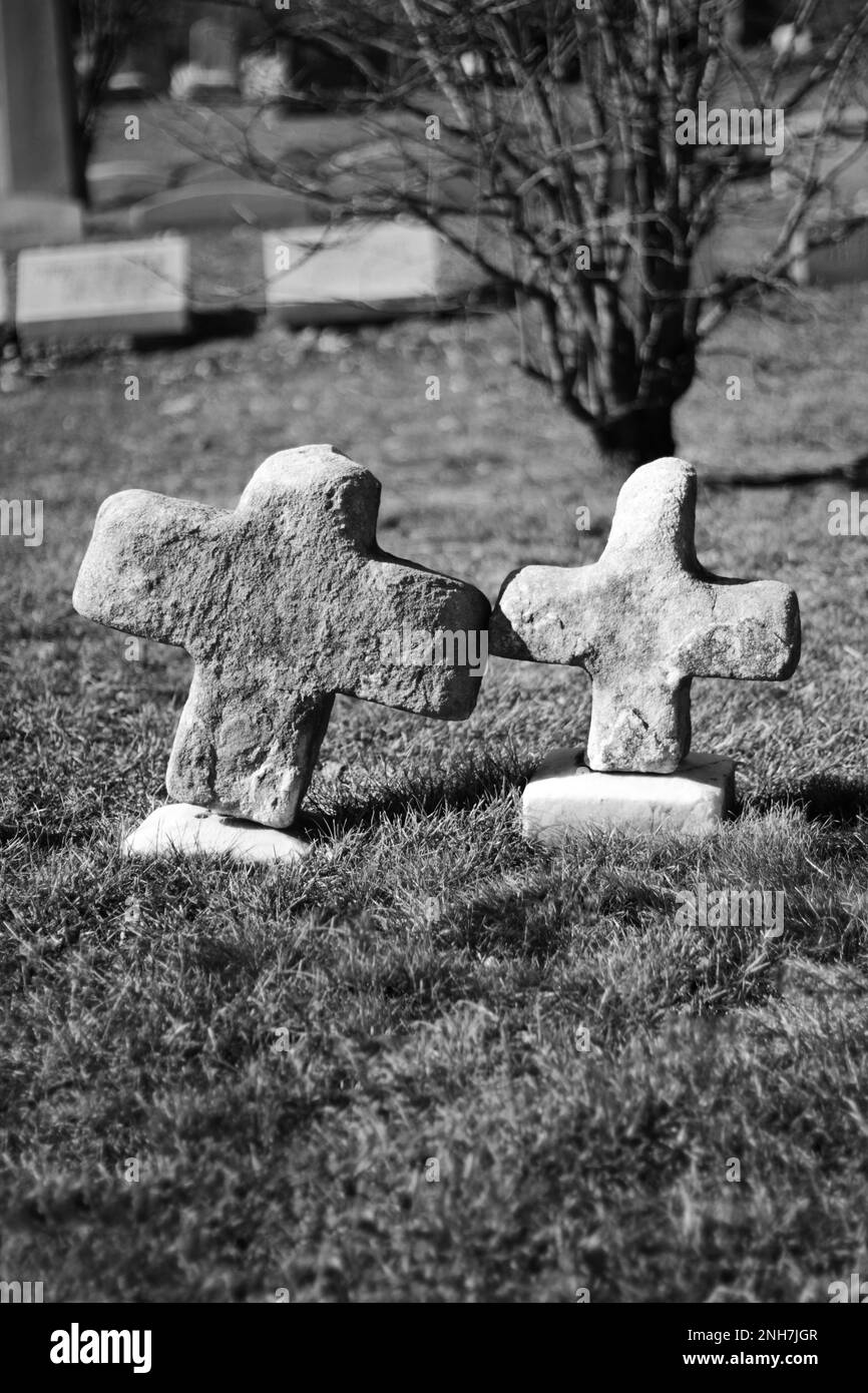 Two stone crosses reaching out for each other forever and ever even in ...