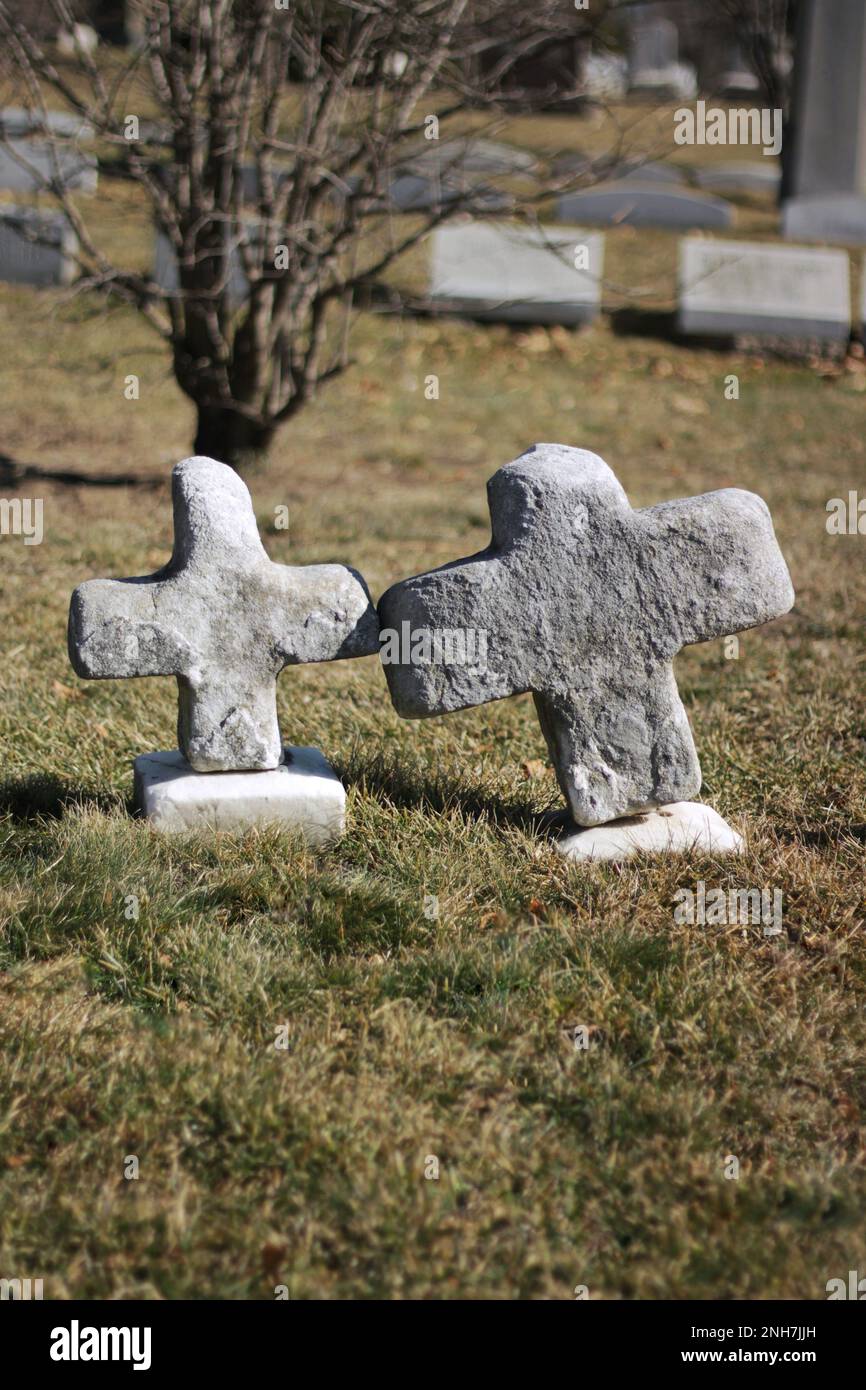 Two stone crosses reaching out for each other forever and ever even in ...