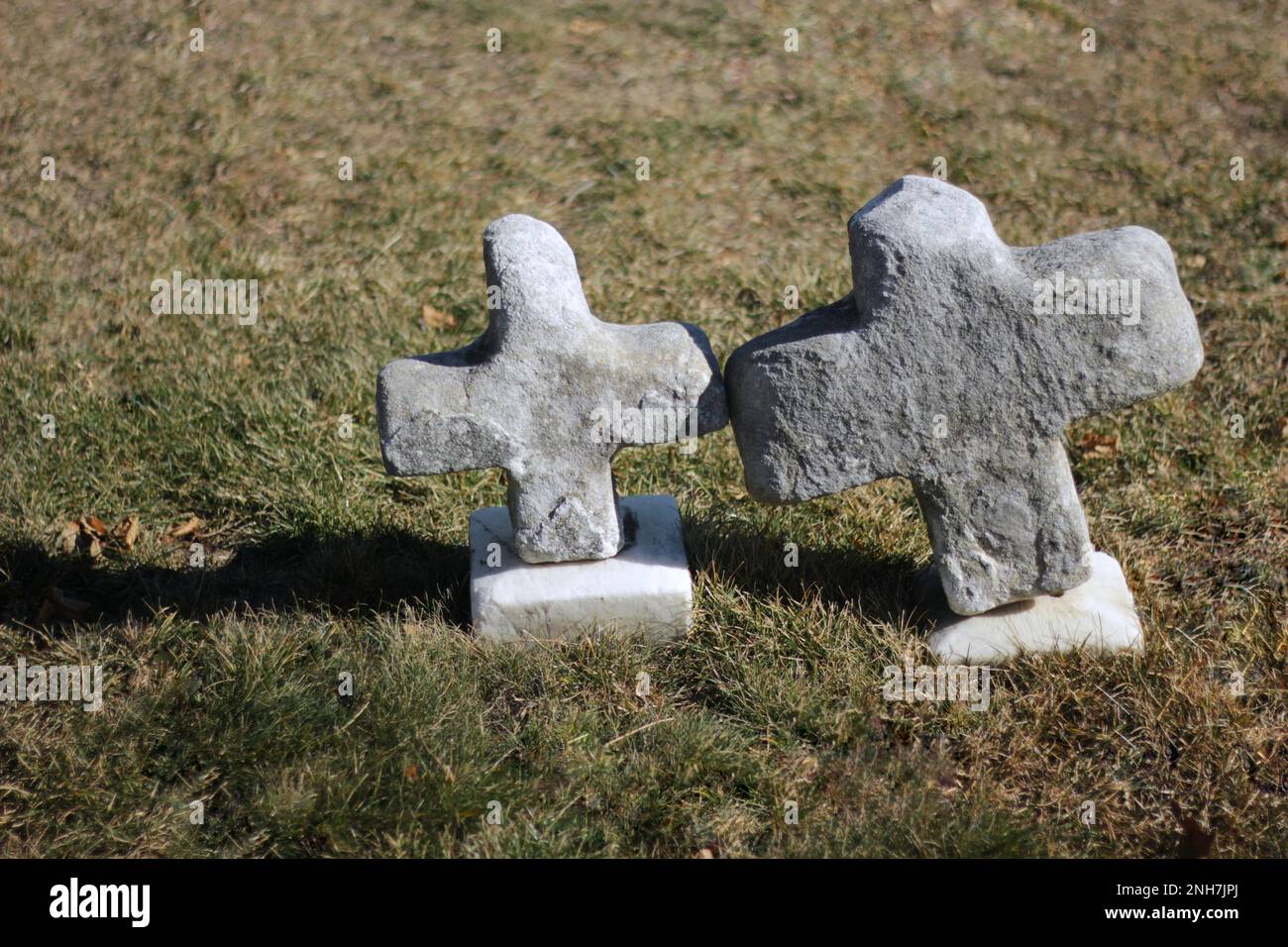 Two stone crosses reaching out for each other forever and ever even in ...
