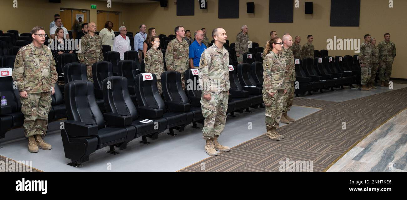 The official guests and audience members listen to Ruffles and ...