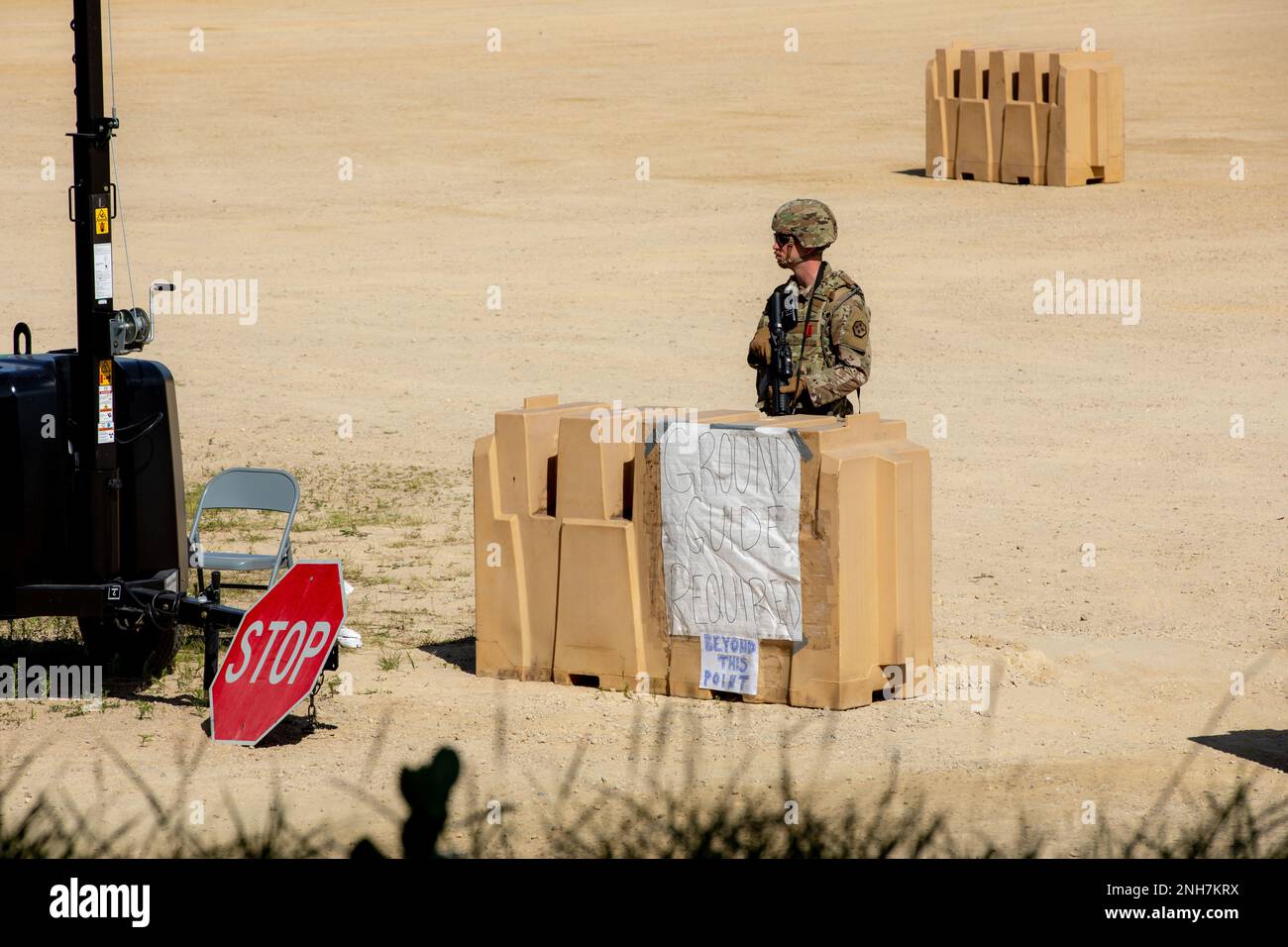A soldier from the 231st Transportation Company, armed with an M4 ...