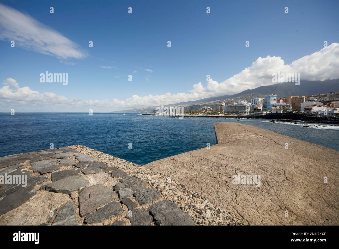 Warm sunshine palliative view from Puerto de la Cruz harbour across the ...