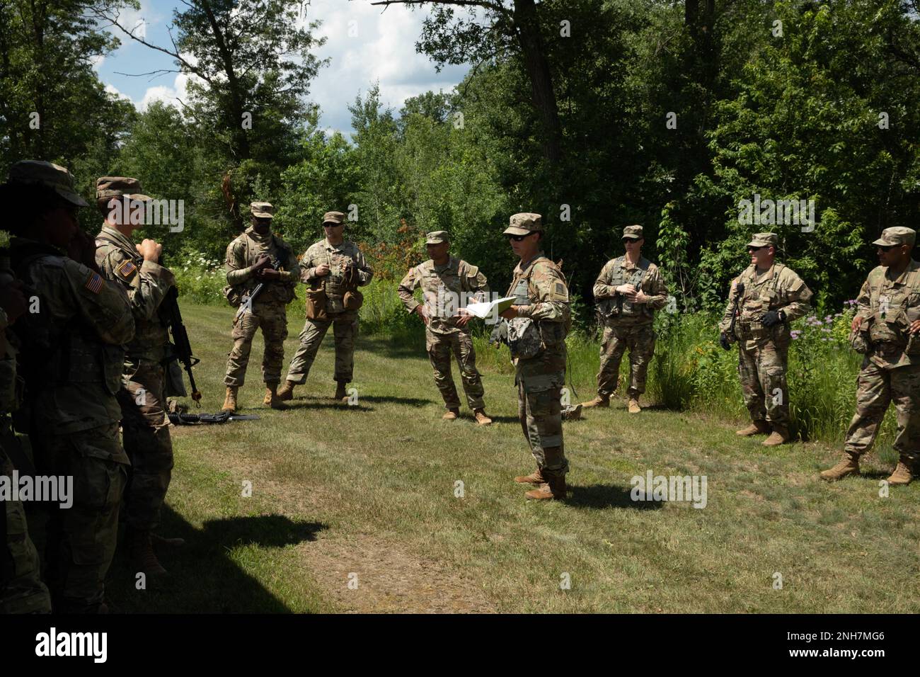 A soldier conducts an after-action review (AAR) following a mounted ...