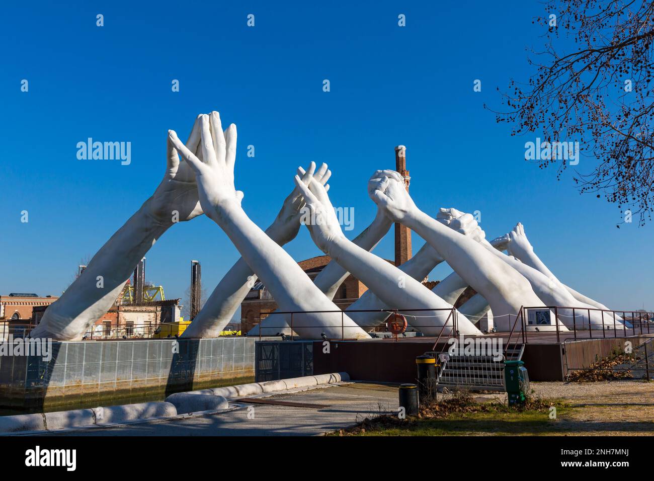 Building Bridges sculpture by artist Lorenzo Quinn depicting 6 pairs of ...