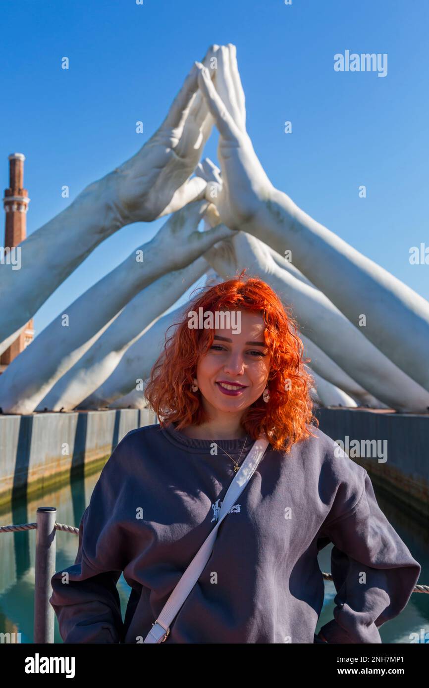 Building Bridges sculpture by artist Lorenzo Quinn depicting 6 pairs of ...