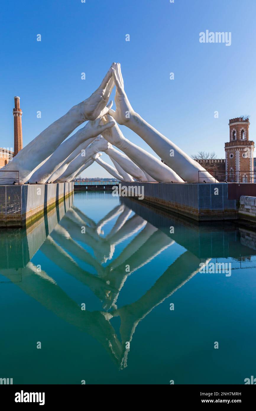 Building Bridges sculpture by artist Lorenzo Quinn depicting 6 pairs of ...