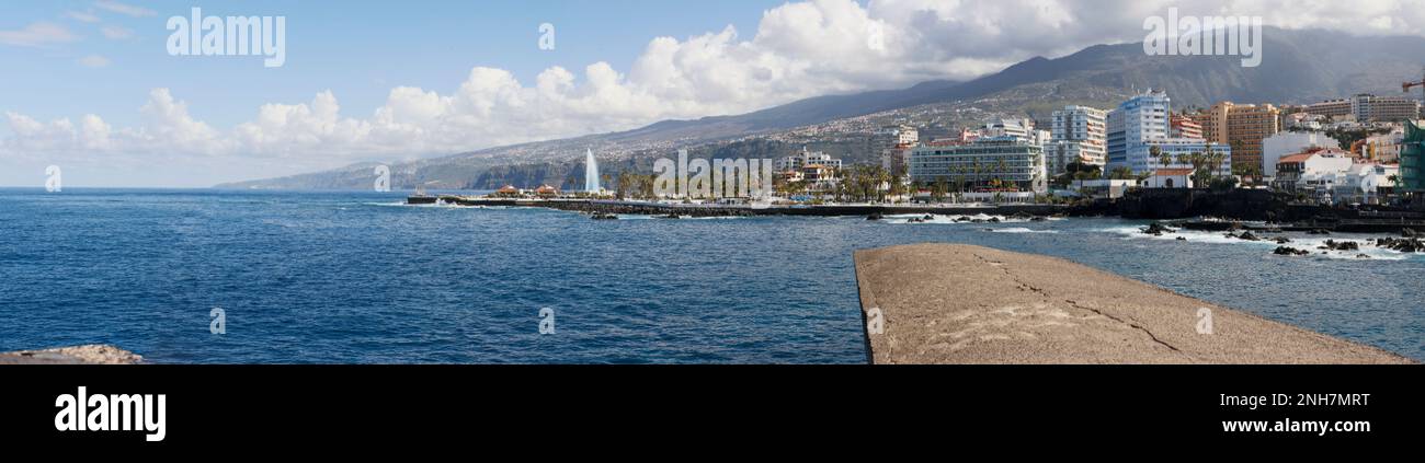 Warm sunshine palliative view from Puerto de la Cruz harbour across the ...
