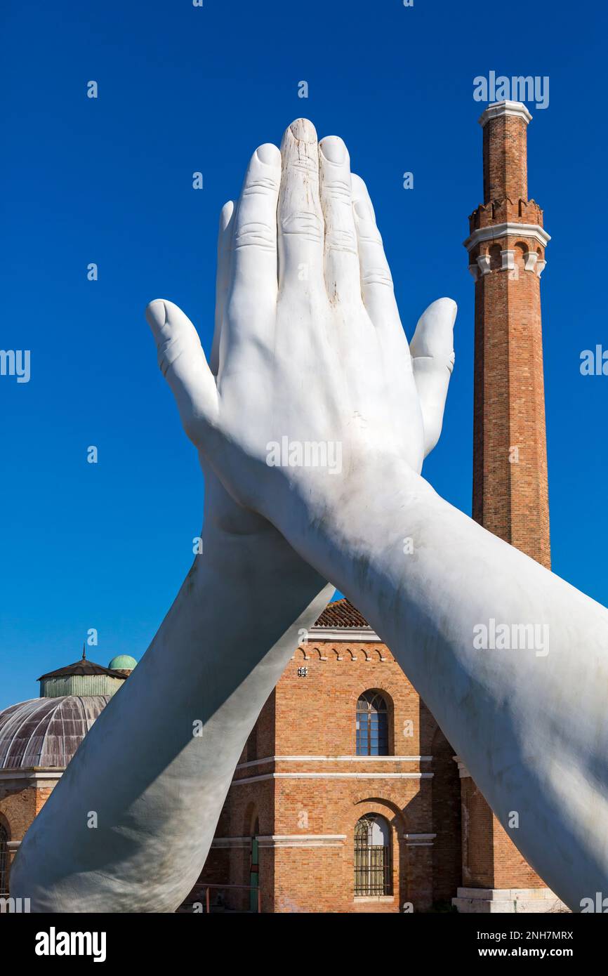 Building Bridges sculpture by artist Lorenzo Quinn depicting 6 pairs of ...