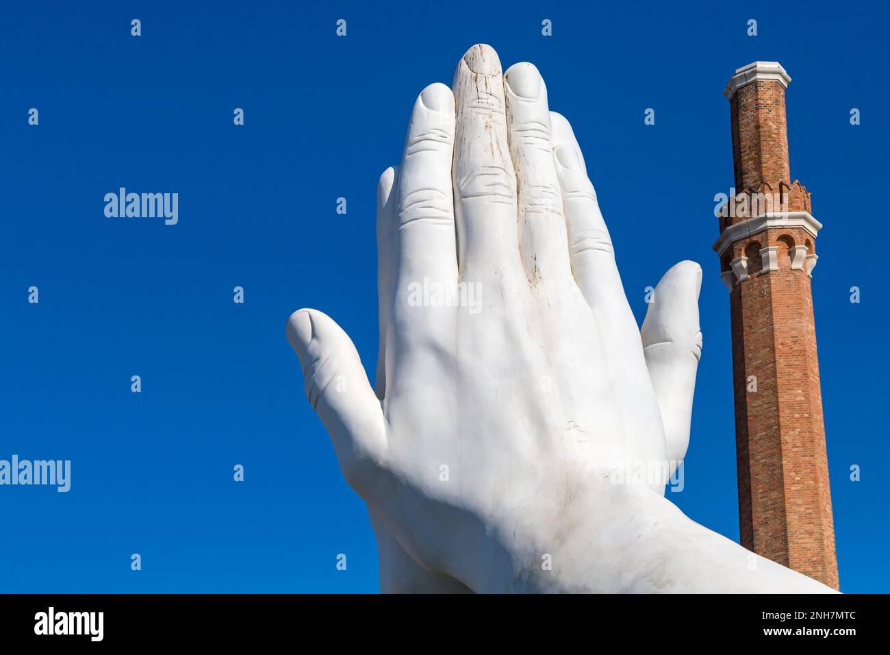 Building Bridges sculpture by artist Lorenzo Quinn depicting 6 pairs of ...