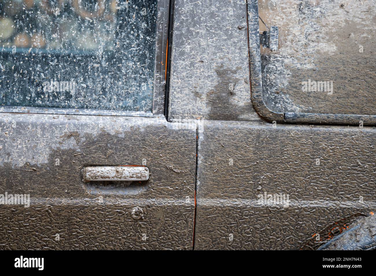 Mad splattered 4x4 SUV. Dirty car side. Splash and texture of mud on a ...
