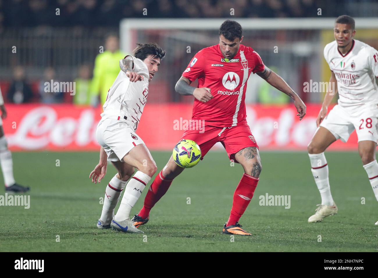 Sandro Tonali of Milan (L) and Andrea Petagna of Monza (C) in action ...