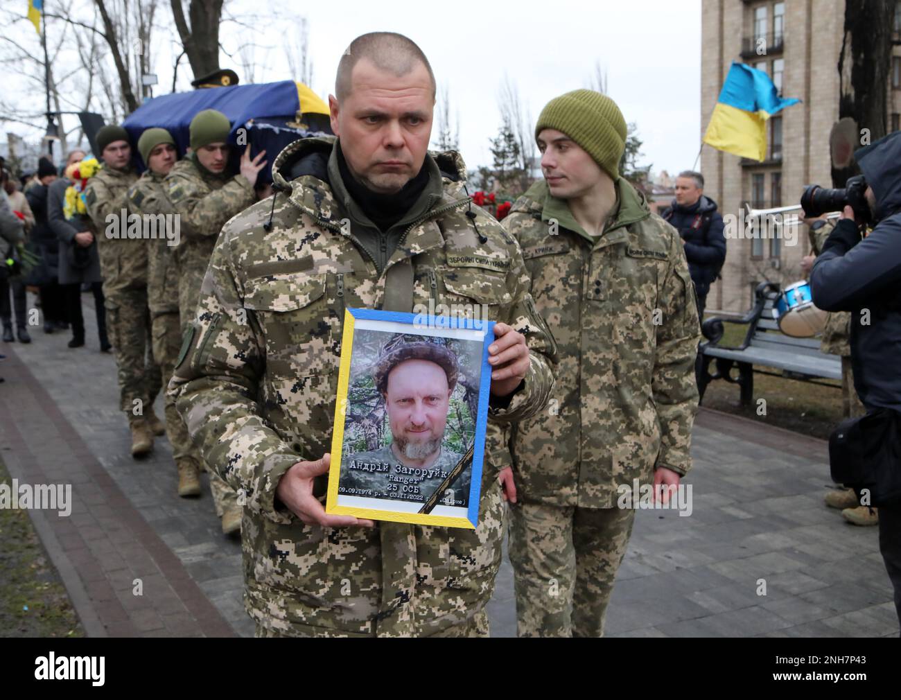 KYIV, UKRAINE - FEBRUARY 21, 2023 - A funeral procession moves from the ...