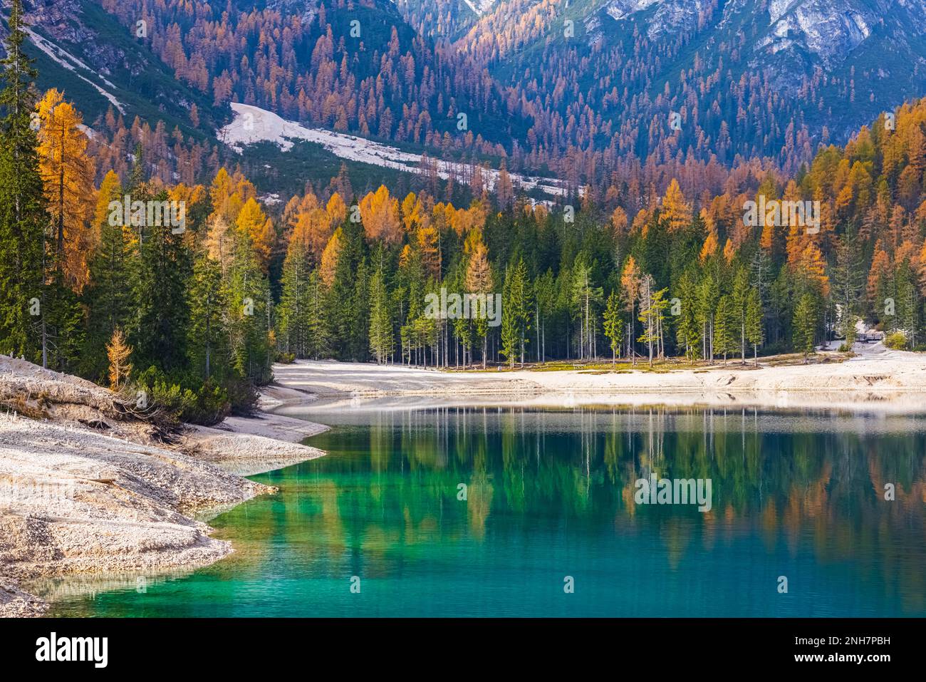 A peaceful autumn morning with plenty of fall colors from the larch ...