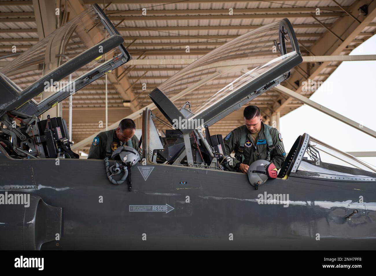 U.S. Air Force U.S. Air Force Capt. Tyler “Rico” Parker, right, an ...