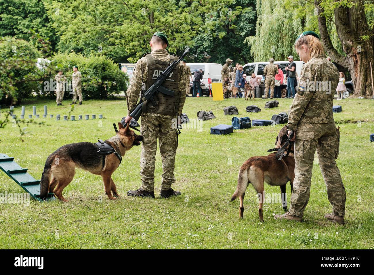 Ukrainian border guards with service dogs. Training of working dog ...